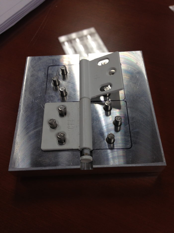 Door Hinge Fixture - Northern Lights Solutions